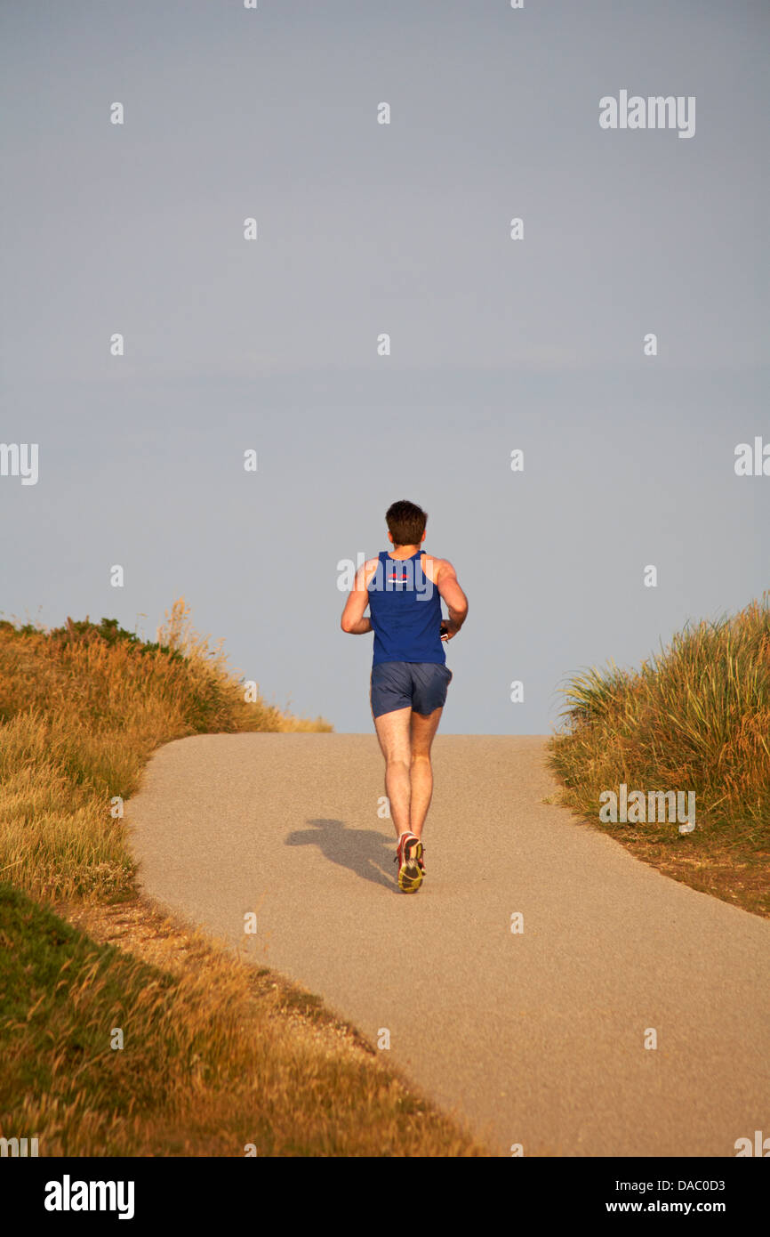 Running man front runner hi-res stock photography and images - Alamy