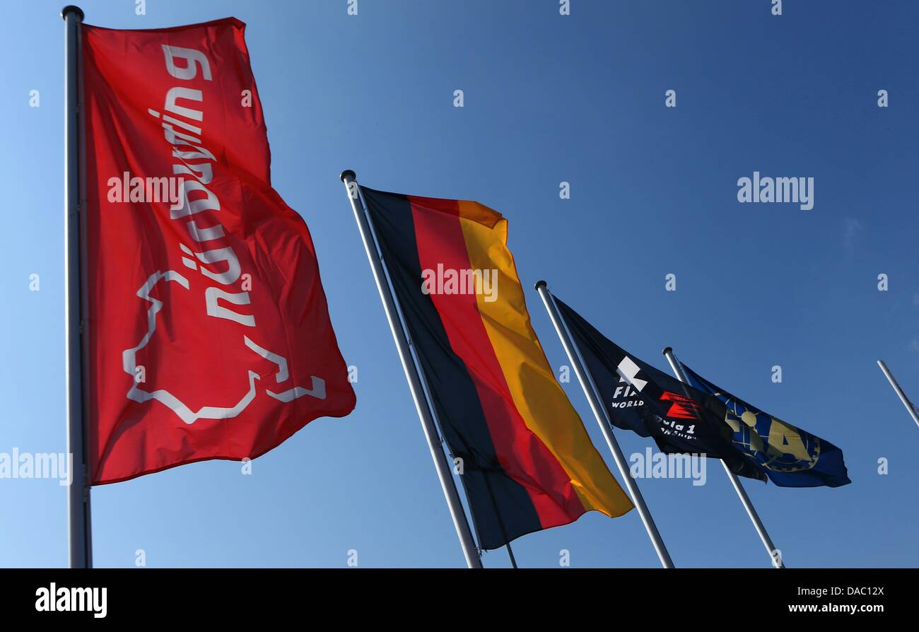 The flags of the Nürburgring, the German flag and the flags of the FIA ...