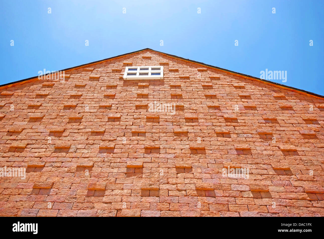 White window on the brick building and blue sky Stock Photo - Alamy