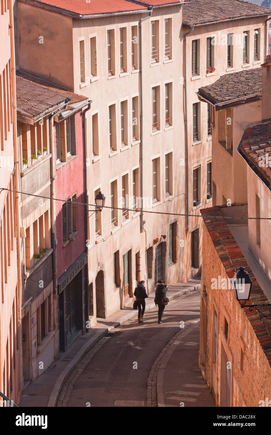 People walking through the old part of the city of Lyon, Lyon, Rhone ...