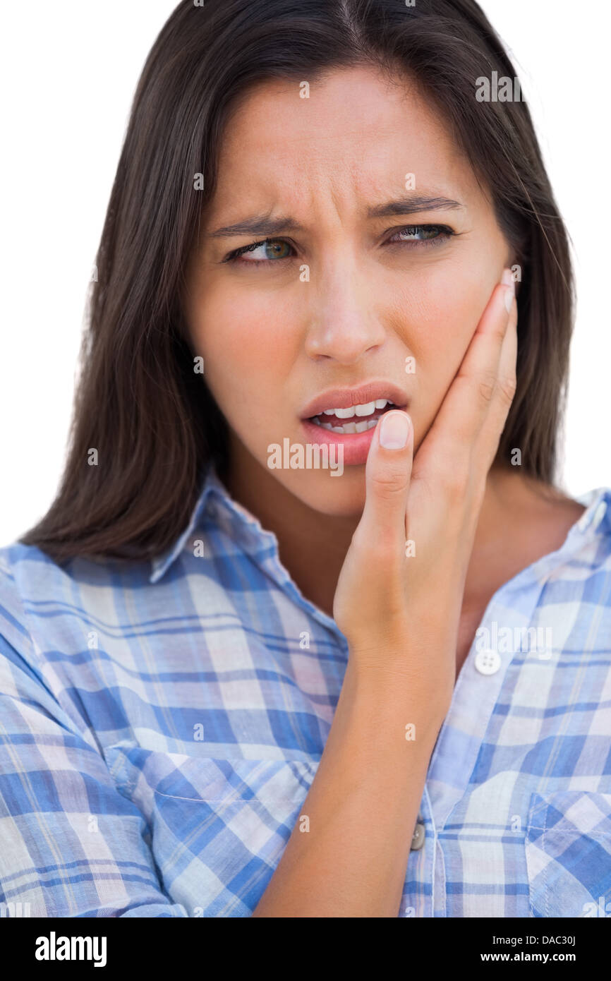 Brunette with a toothache Stock Photo - Alamy