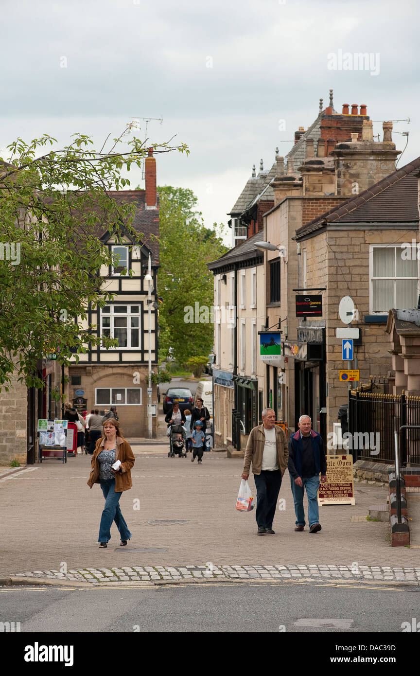 Pedestrians in the small rural town of Bolsover in Derbyshire, England ...