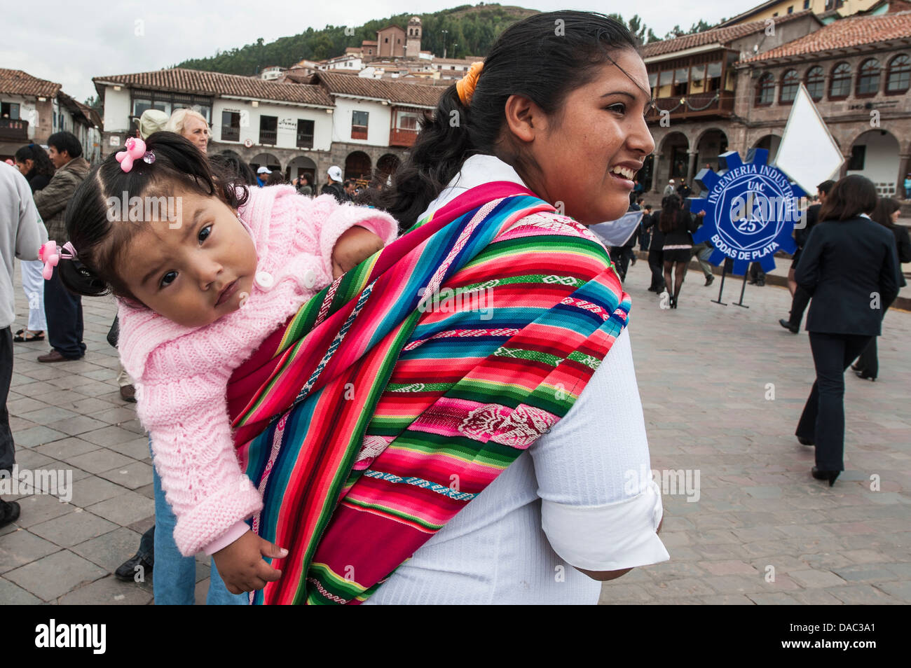 Inca incan mother woman in traditional blanket and carrying child baby ...