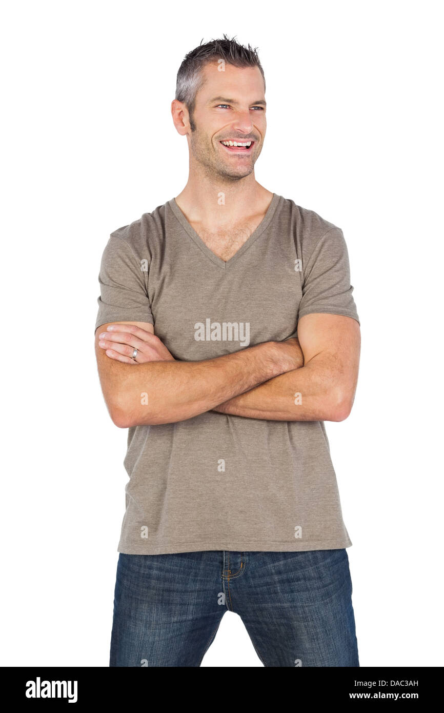 Handsome man smiling with arms crossed Stock Photo - Alamy