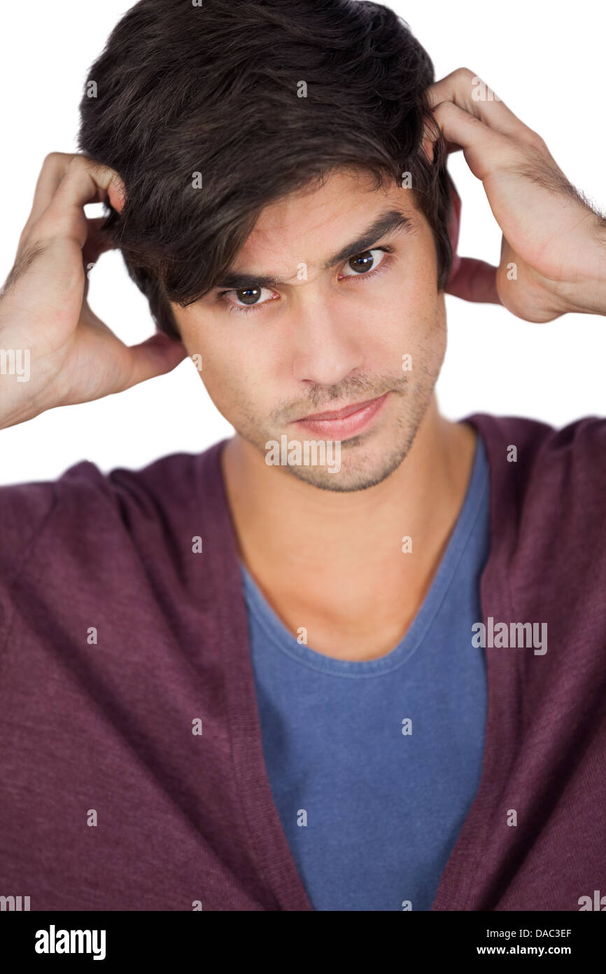 Man looking at camera, hands on head hi-res stock photography and ...