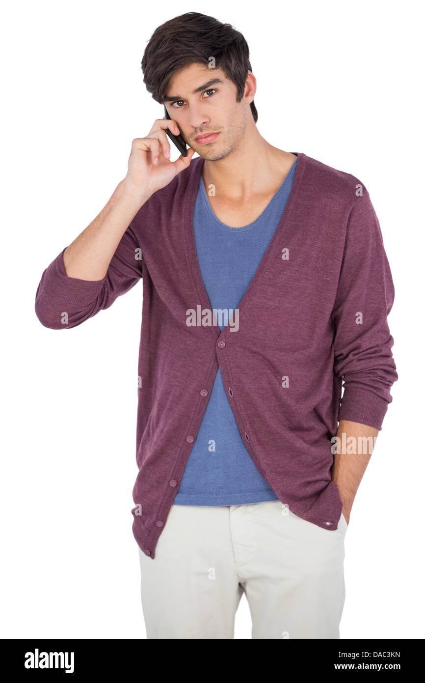 Serious man speaking on the phone Stock Photo - Alamy
