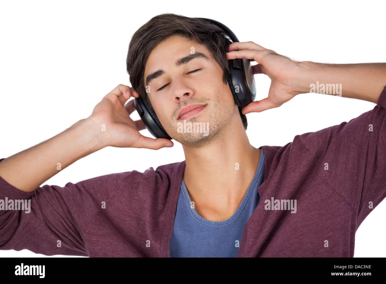 Man using headphones to listen music Stock Photo - Alamy