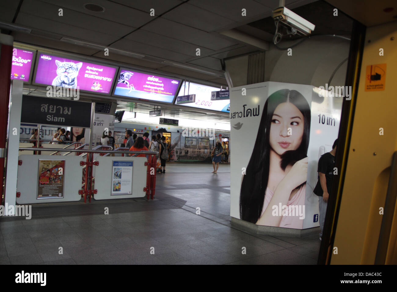 An advertisement display in Siam BTS station in Bangkok , Thailand ...