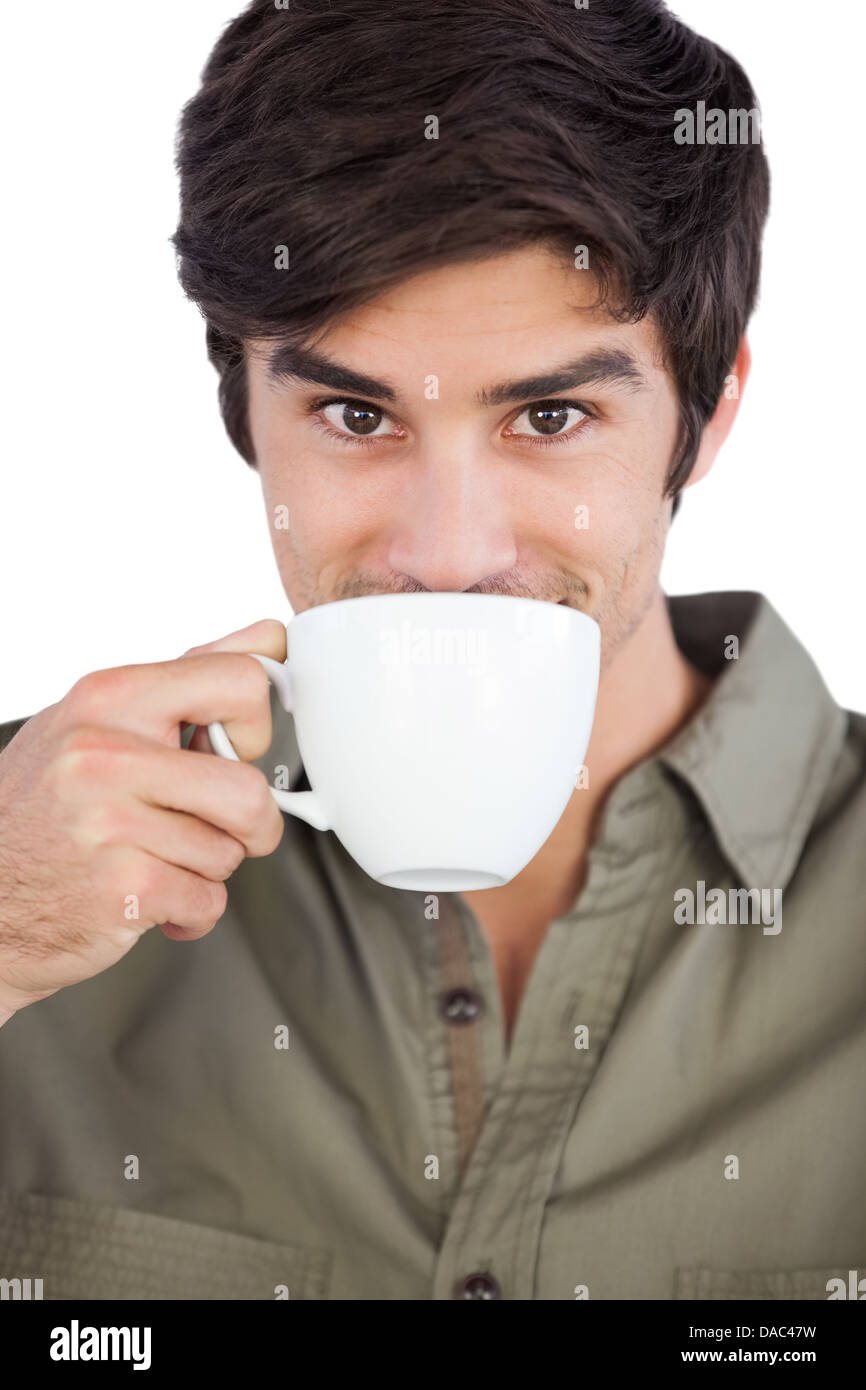 Portrait of man drinking coffee Stock Photo - Alamy