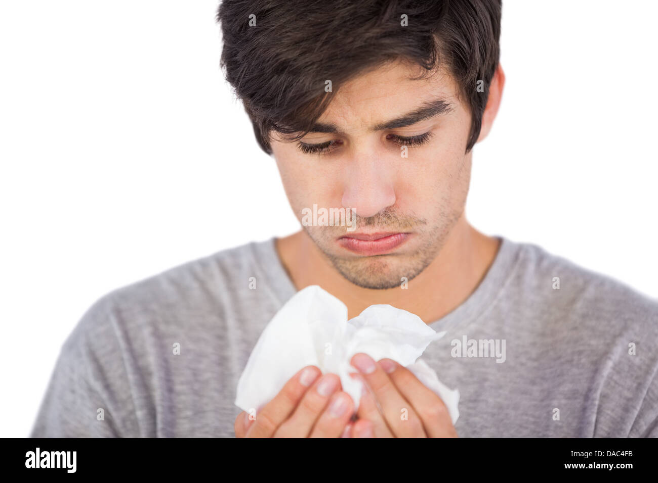 Sick man using handkerchief Stock Photo - Alamy