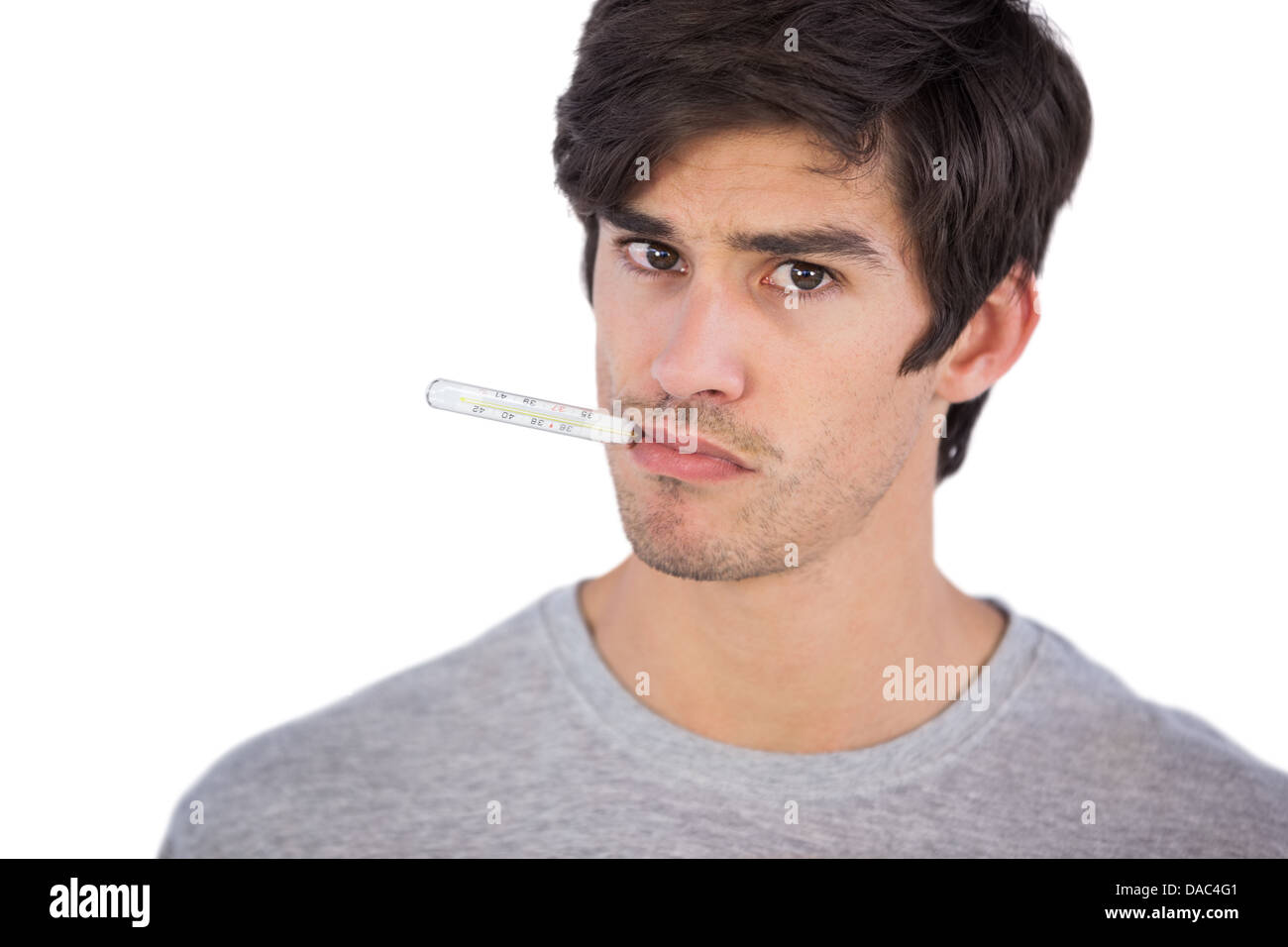 Man using a thermometer Stock Photo - Alamy