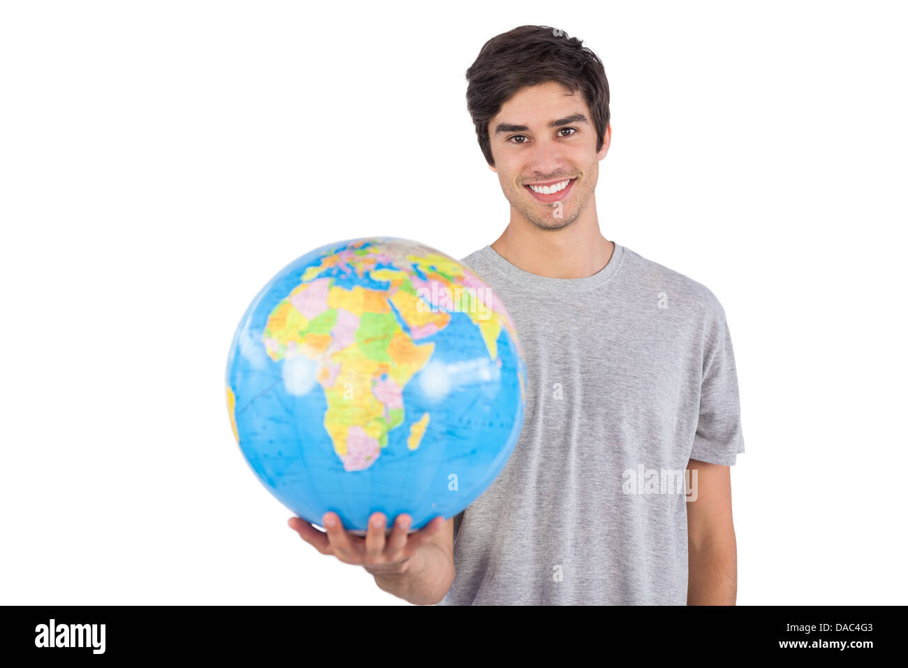 Man holding a globe Stock Photo - Alamy