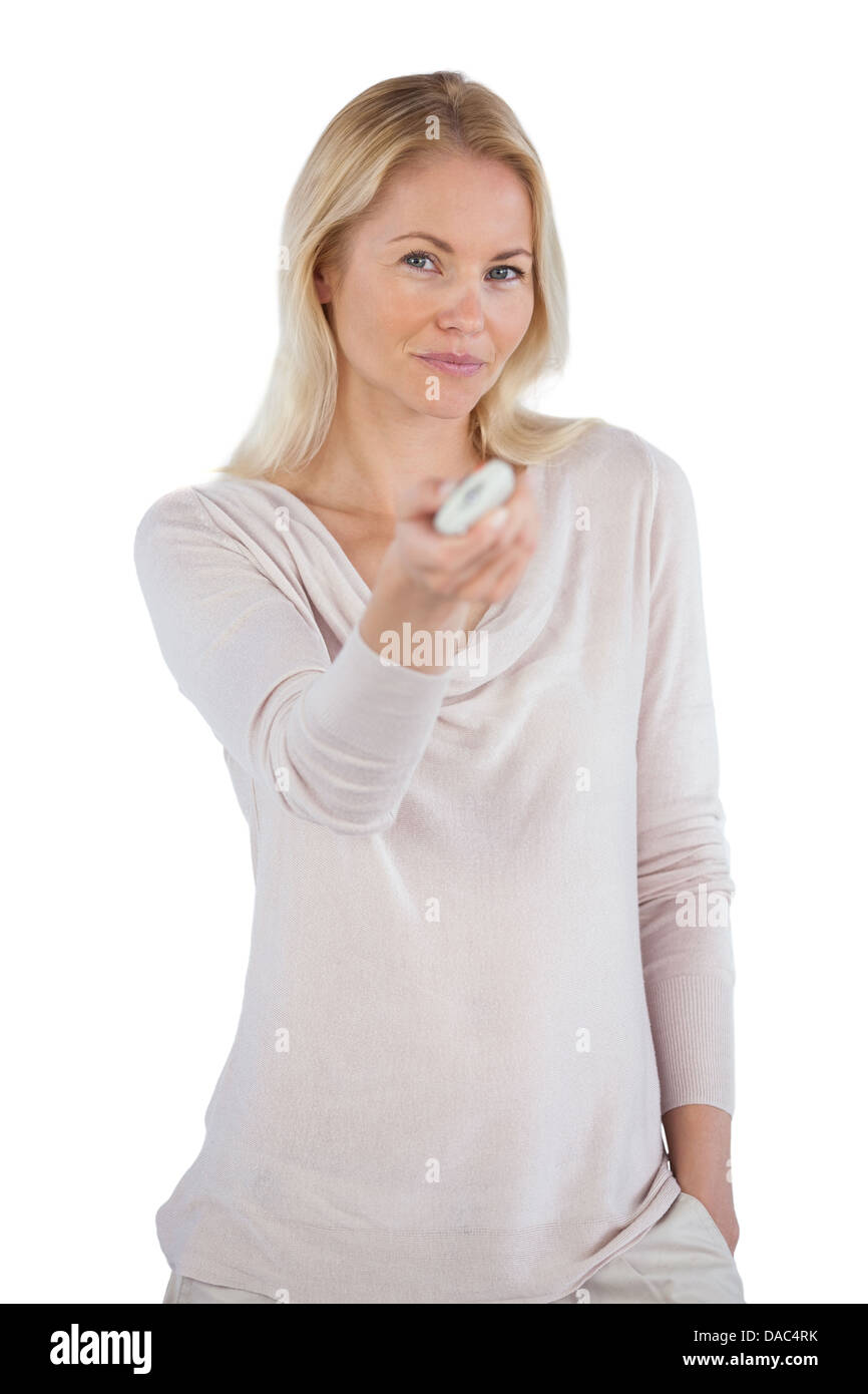 Smiling woman using remote control Stock Photo - Alamy Smiling woman using remote control Stock Photo - Alamy