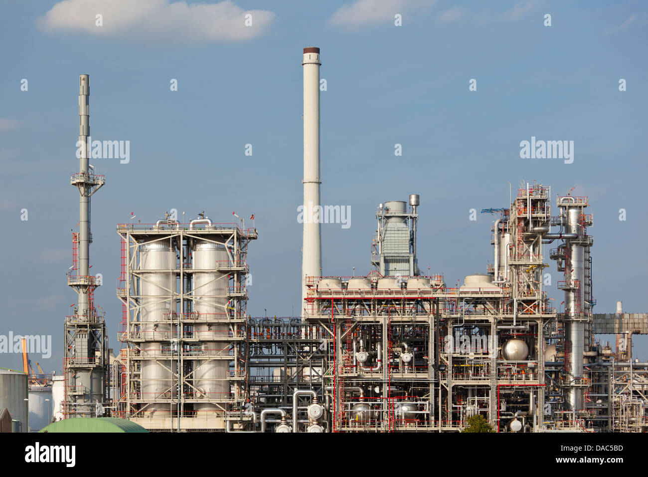 Distillation towers and pipes in a refinery during daytime Stock Photo ...