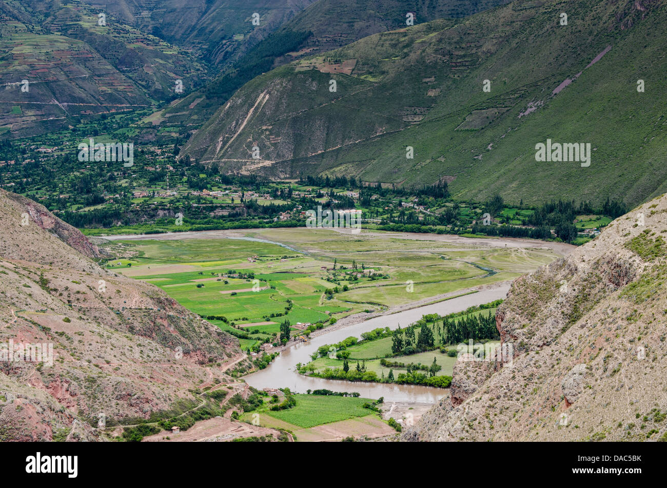 Andes mountainous landscape river farmland in Sacred Valley near Maras ...