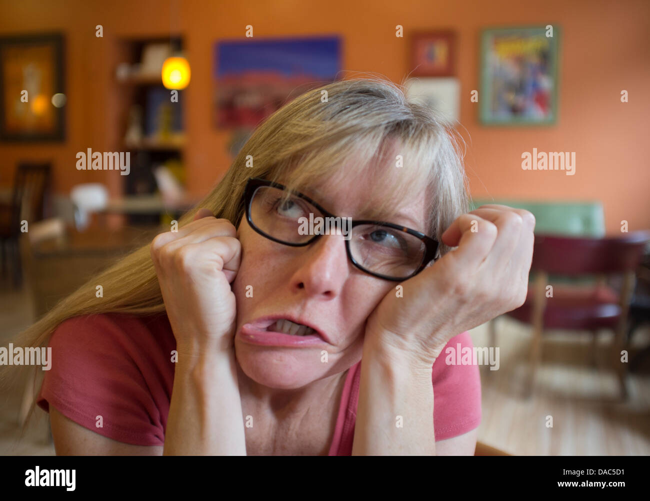Goofy expression woman hi-res stock photography and images - Alamy