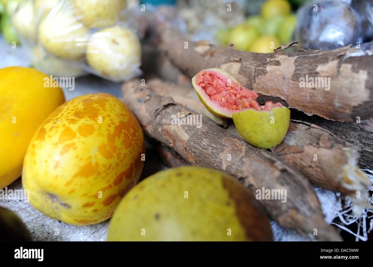 Various types of fruit are for sale at a market in Maputo, Mozambique ...