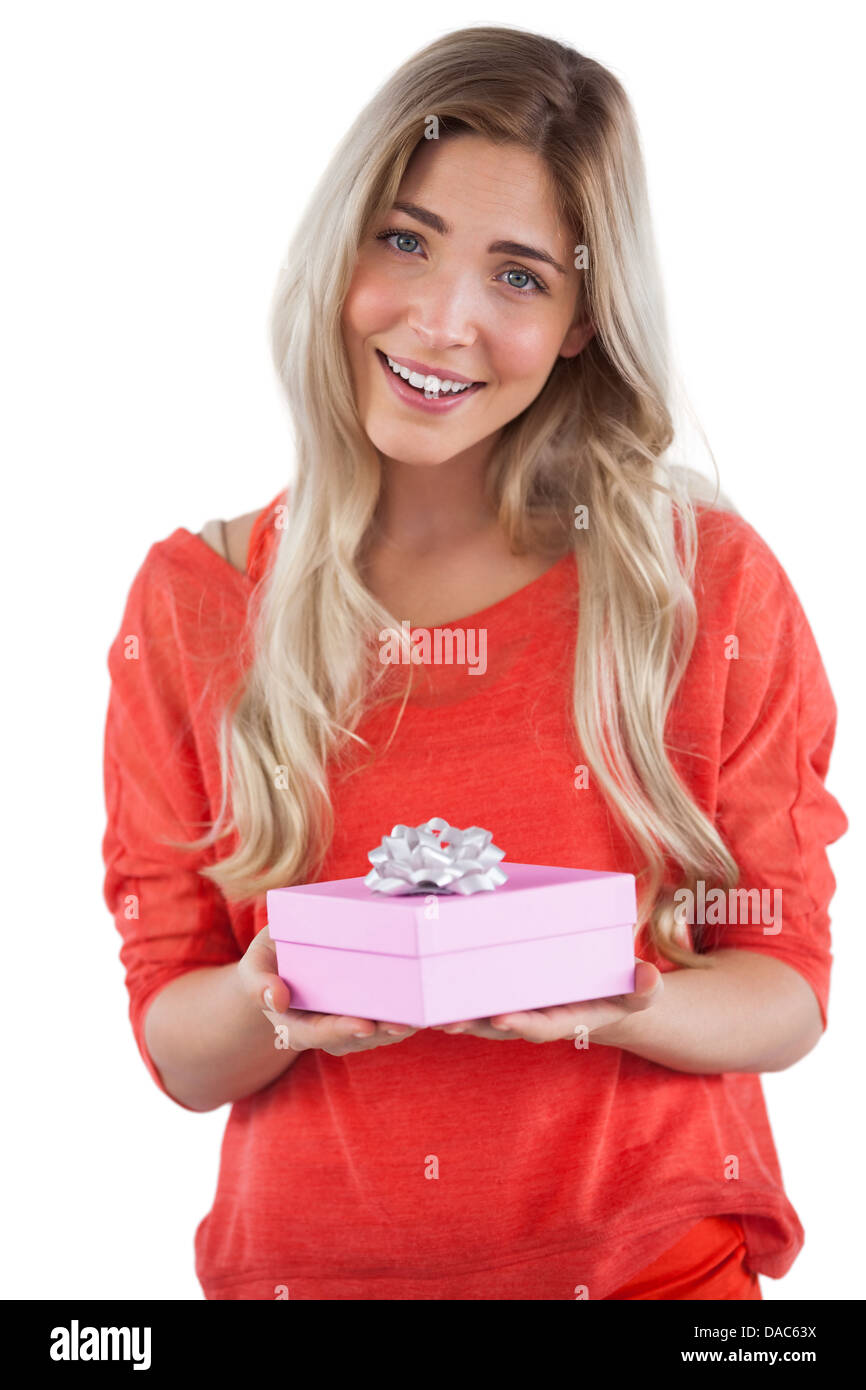 Blonde woman receiving a gift Stock Photo - Alamy