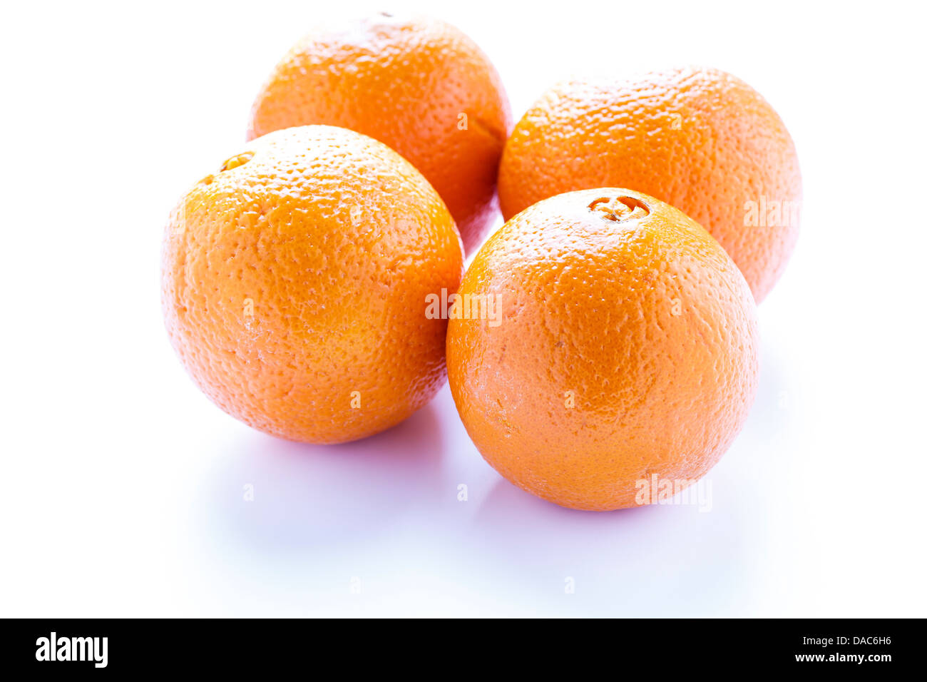 Fresh naval oranges in window light Stock Photo - Alamy
