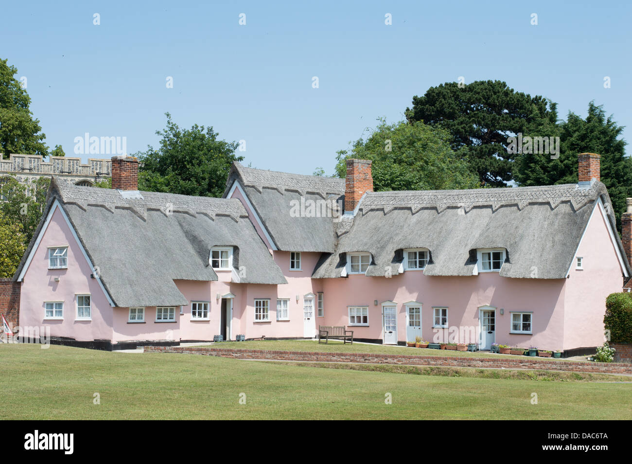 Large pink thatched cottages in Cavendish, Suffolk, England Stock Photo ...