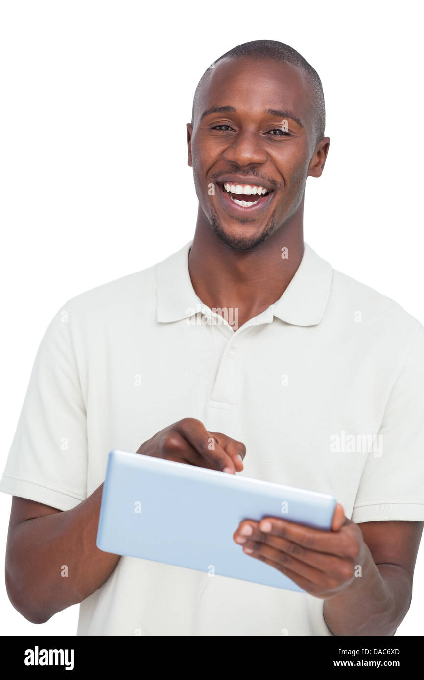 Portrait of a laughing man with tablet pc Stock Photo - Alamy