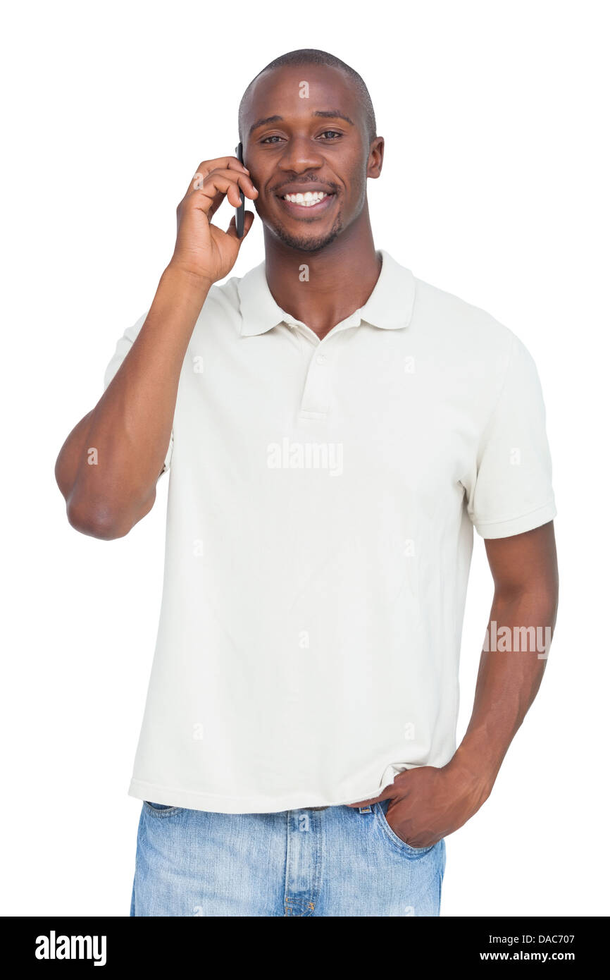 Black man on his phone smiling hi-res stock photography and images - Alamy