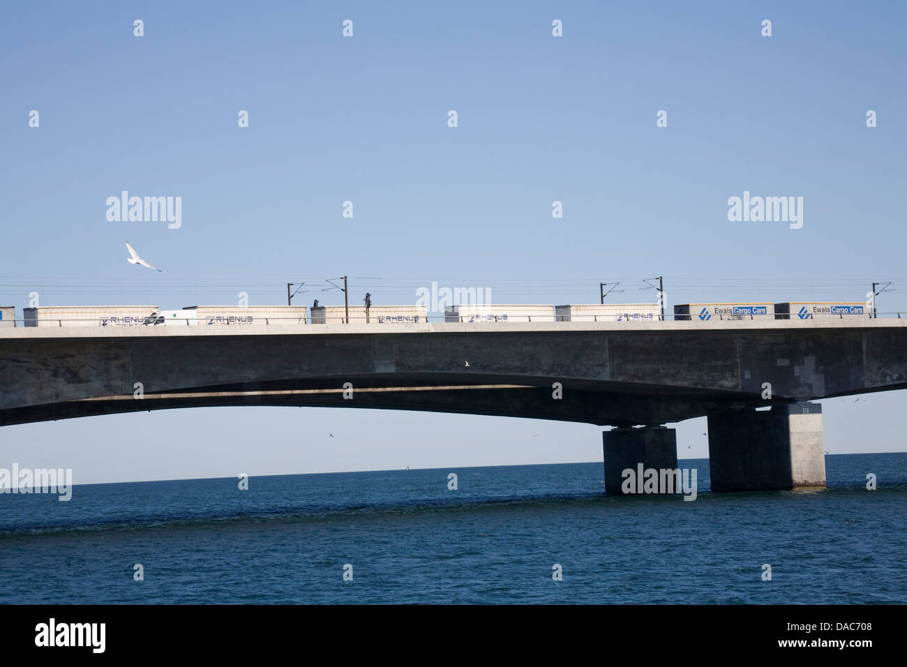 Denmark EU Freight train hauling containers along 18 km Storebælt Bro ...