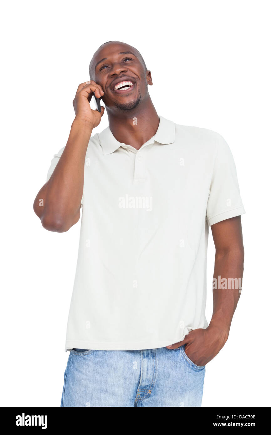 Laughing man while talking on the phone Stock Photo - Alamy
