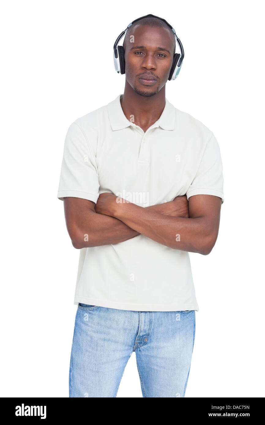 Serious man listening to music Stock Photo - Alamy