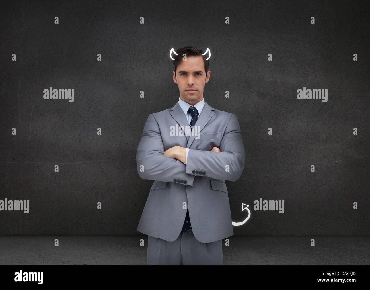 Serious businessman representing the demon Stock Photo - Alamy
