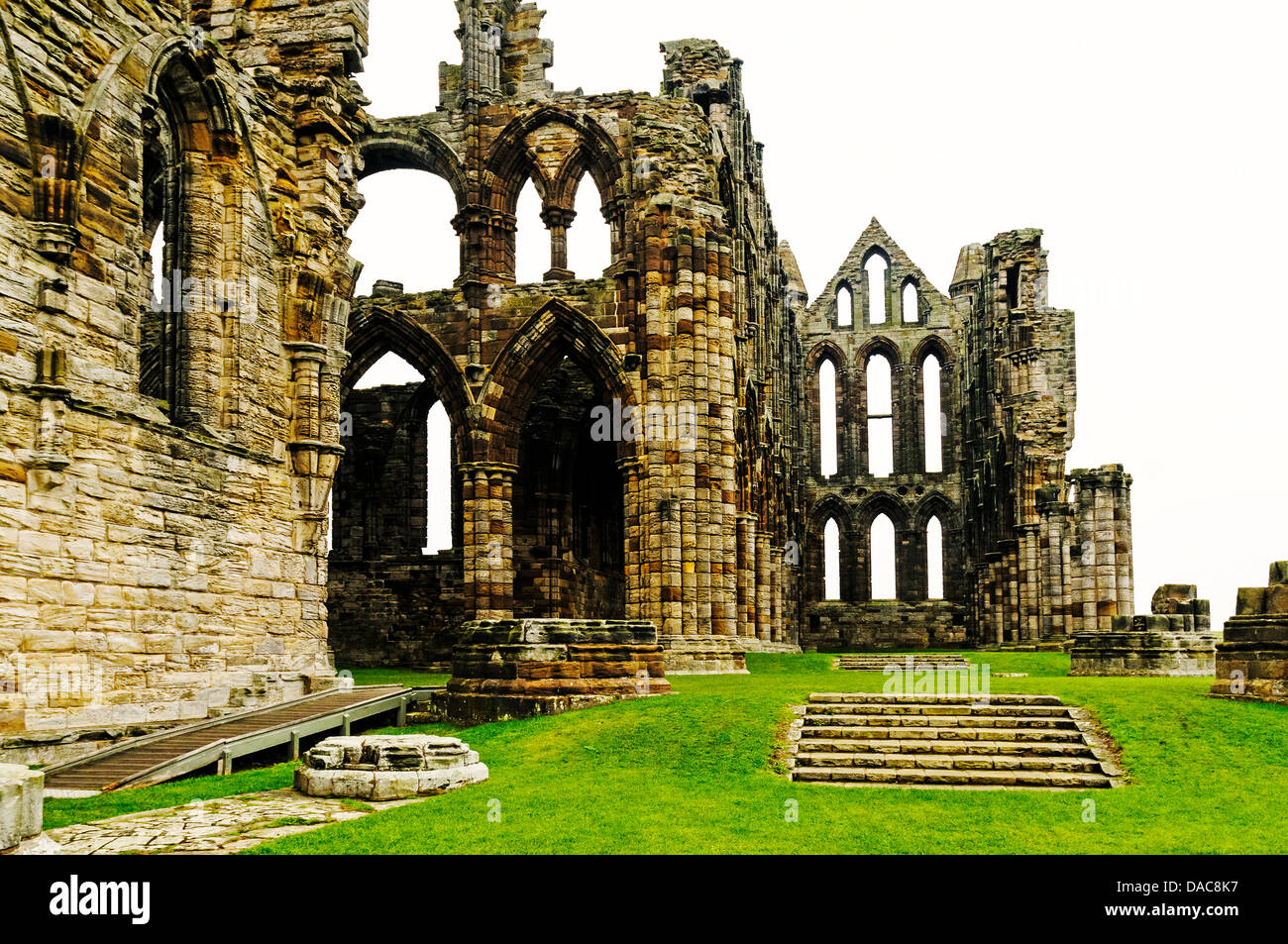 The gaunt skeletal but evocative sandstone ruins of the Abbey with its ...