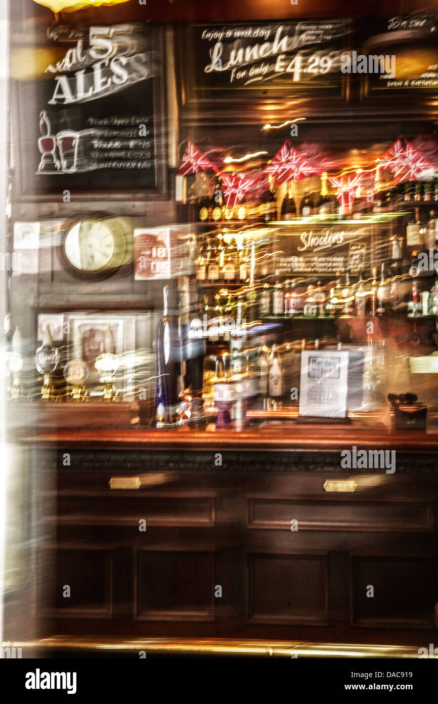 Viewing a traditional British pub bar from the viewpoint of a drunk ...