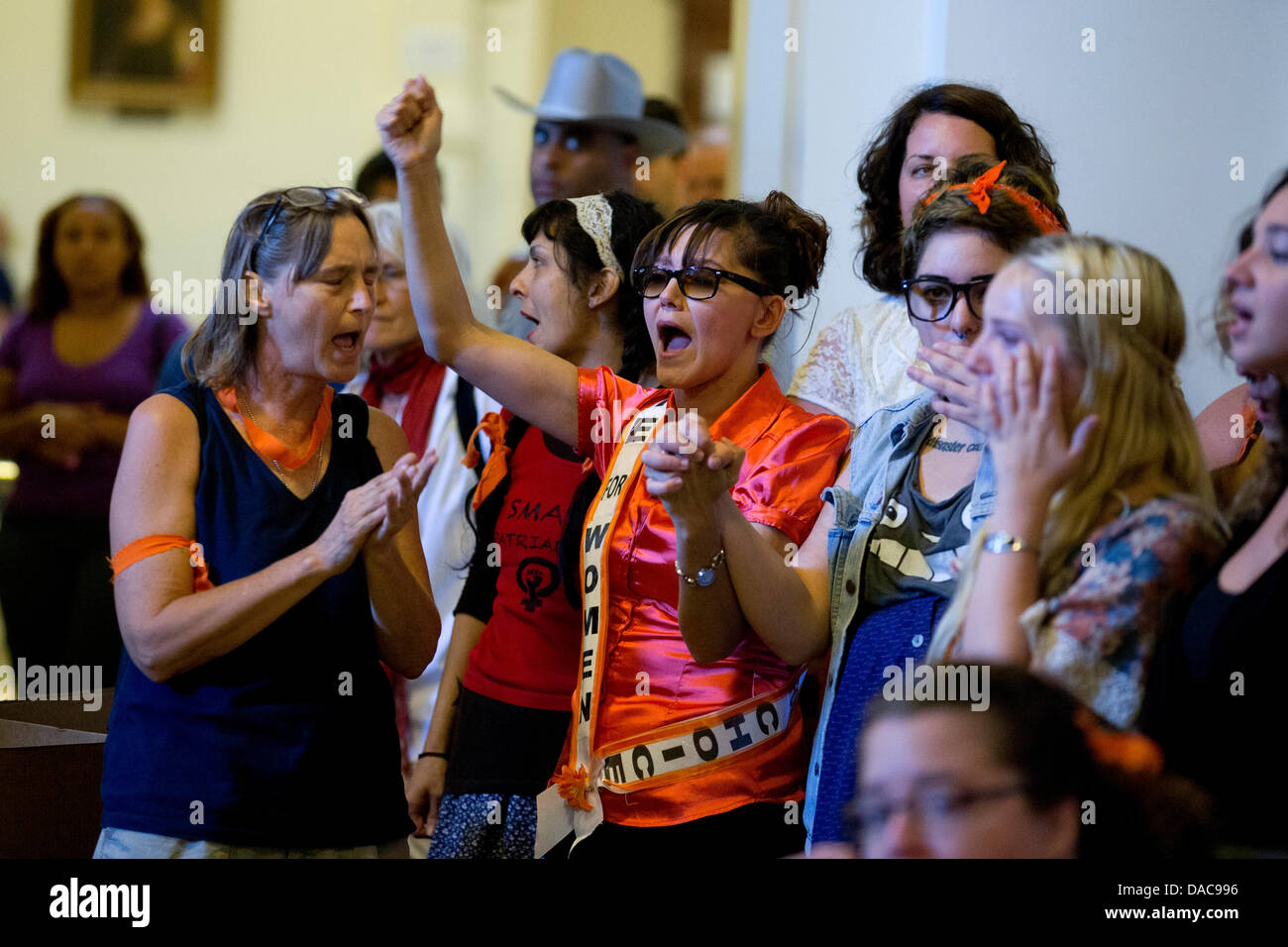 Women's rights and pro-choice advocates yell outside the Texas House ...