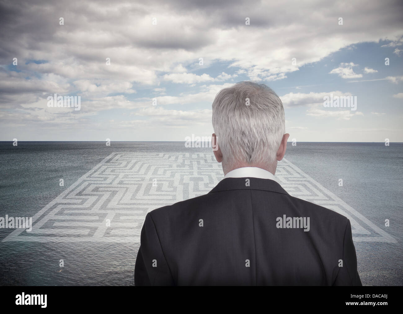 Mature businessman contemplating looking hi-res stock photography and ...