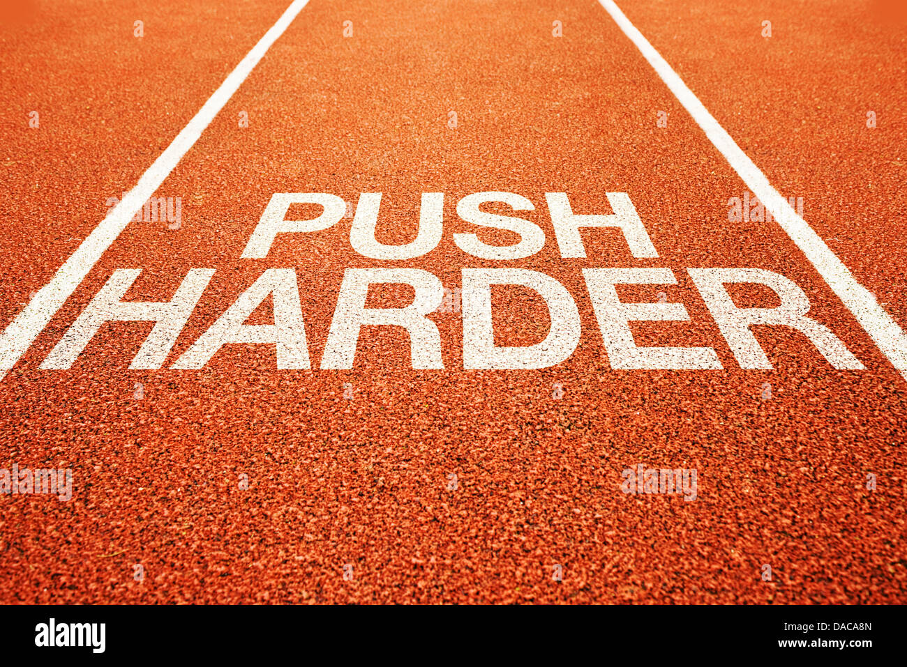 Push harder on athletics all weather running track Stock Photo - Alamy
