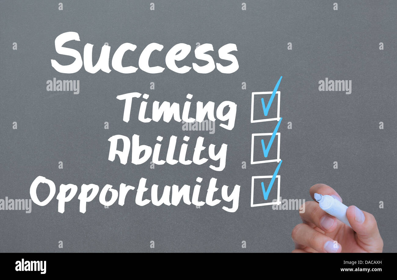 Hand holding a marker and writing success terms Stock Photo - Alamy