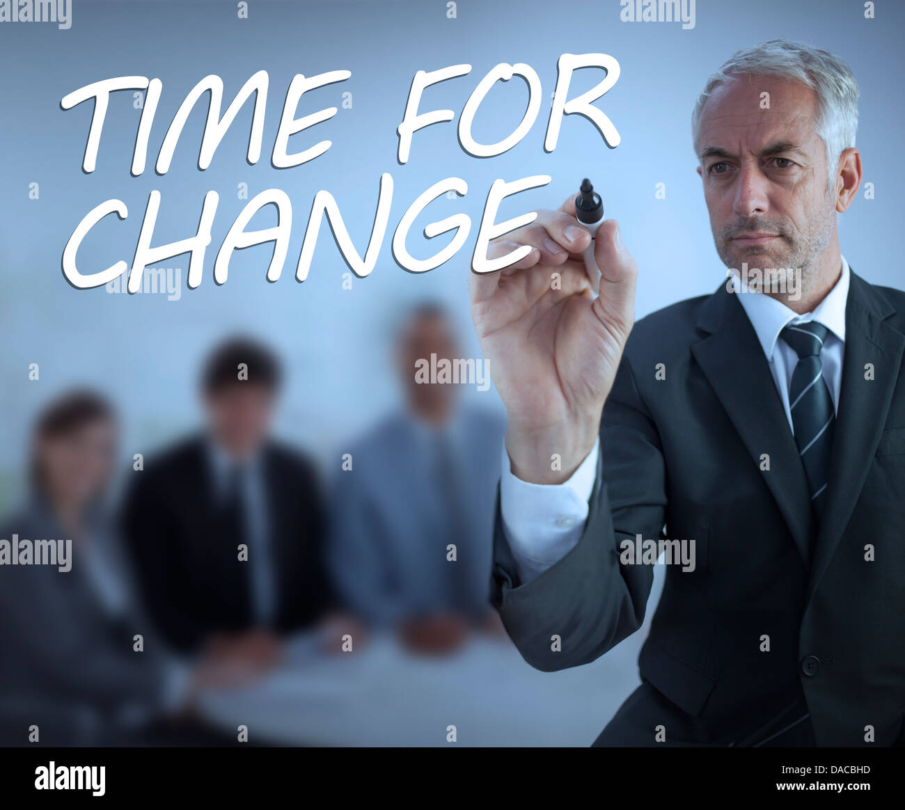 Stylish businessman writing time for change Stock Photo - Alamy