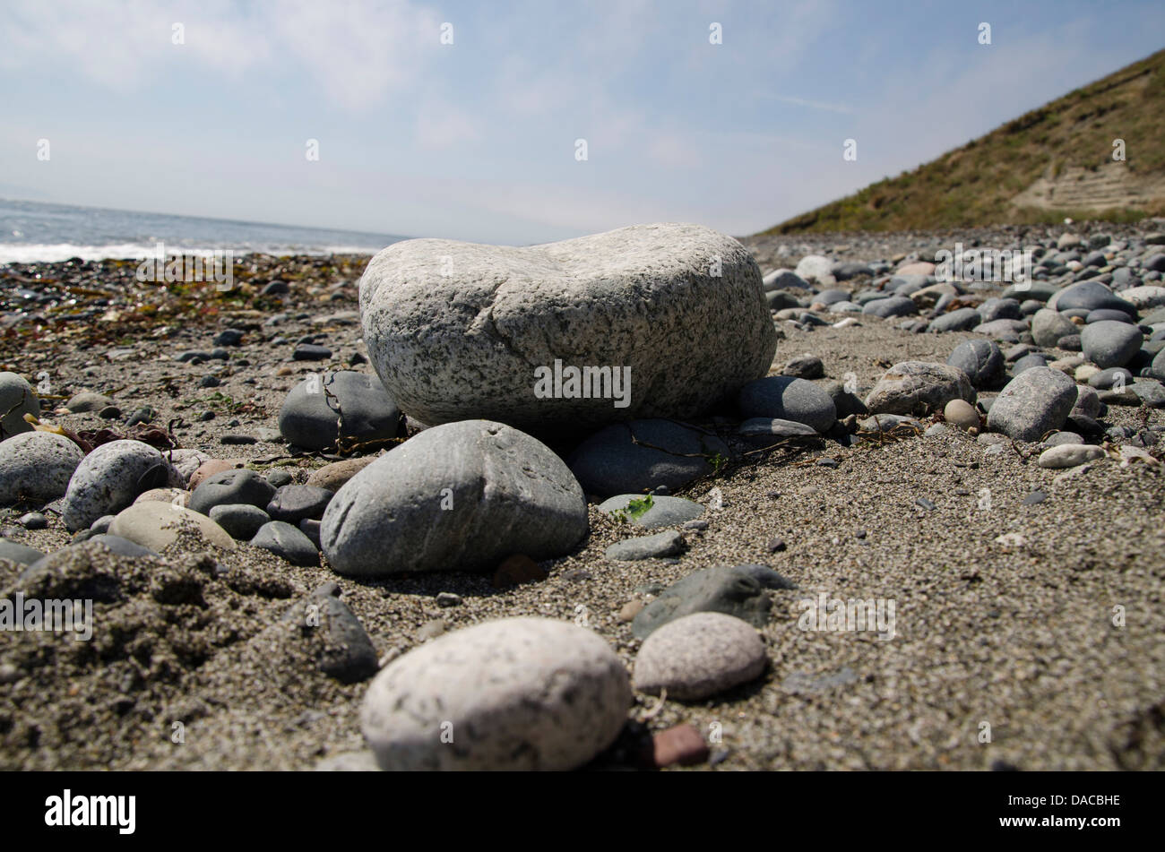 Large pebbles on a beach Stock Photo - Alamy