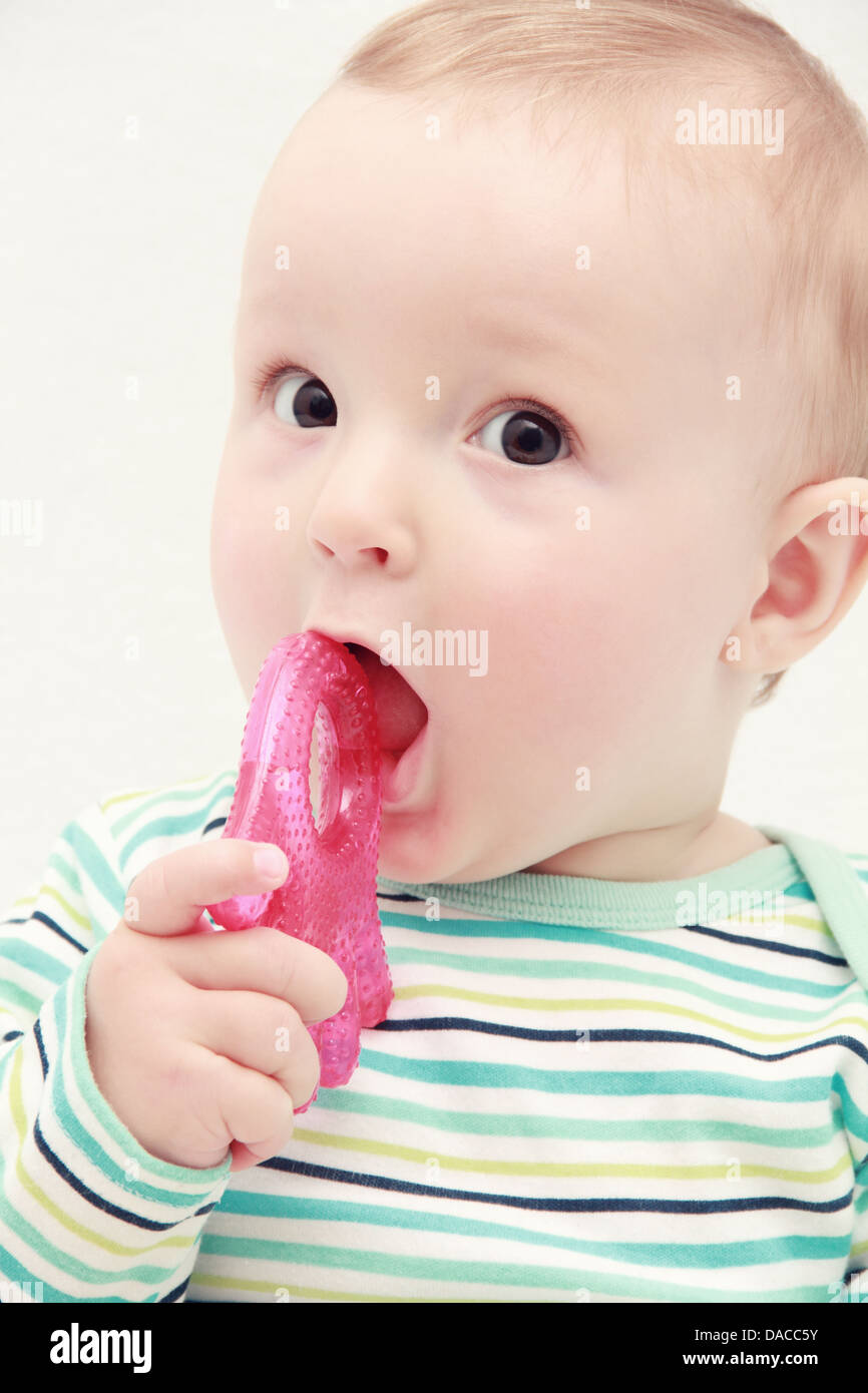 Baby with first tooth hi-res stock photography and images - Alamy