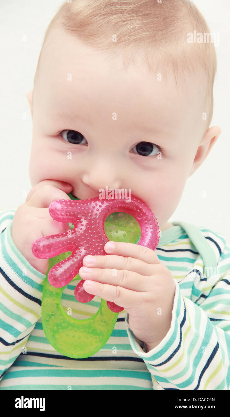 Baby with first tooth hi-res stock photography and images - Alamy