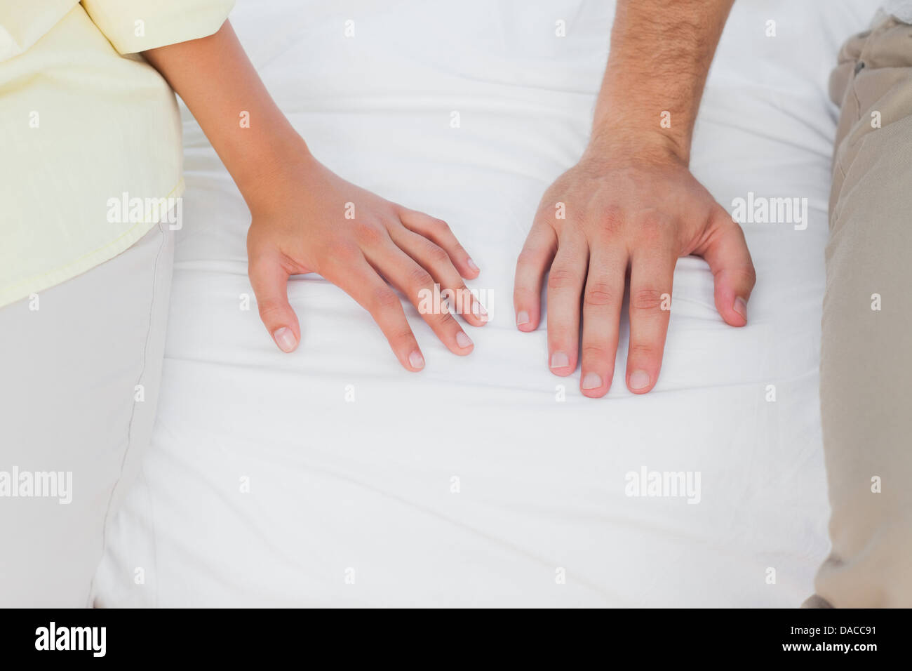 Hands of couple Stock Photo - Alamy
