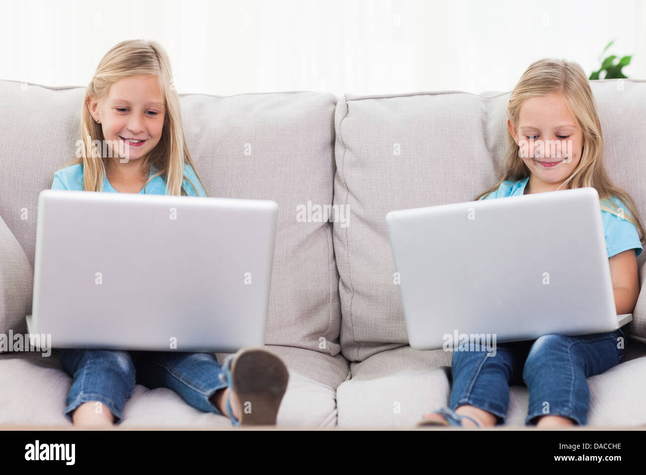 Twins typing hi-res stock photography and images - Alamy