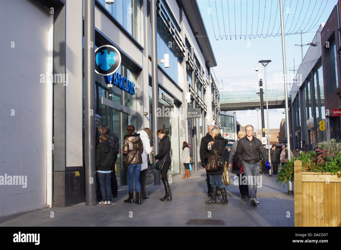 Queueing for the cash point, George Street Altrincham Stock Photo - Alamy