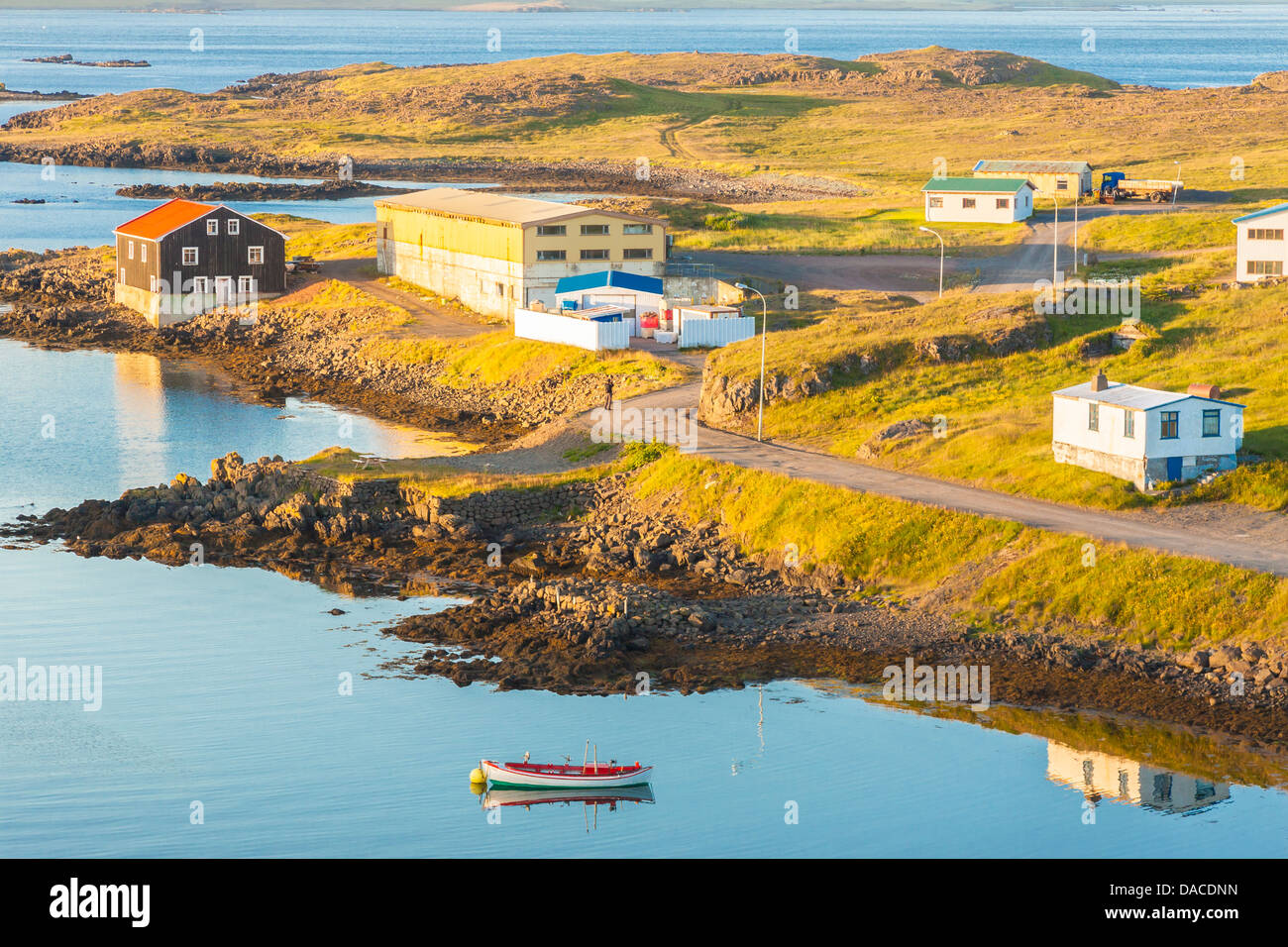 View on small Icelandic fishing village Djupivogur. Coast of ...