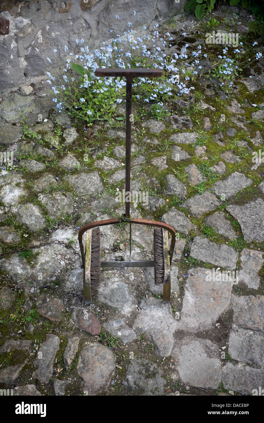 Old Fashioned Boot or Shoe Cleaner Stock Photo - Alamy