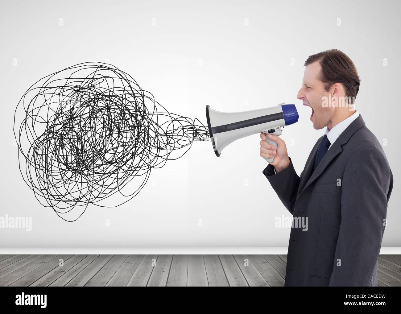 Businessman with a megaphone Stock Photo - Alamy