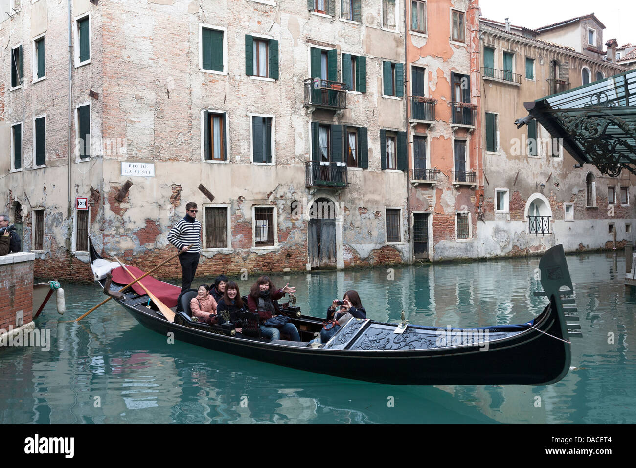 Gondoliere and Gondola in Canal, Venice, Italy Stock Photo - Alamy