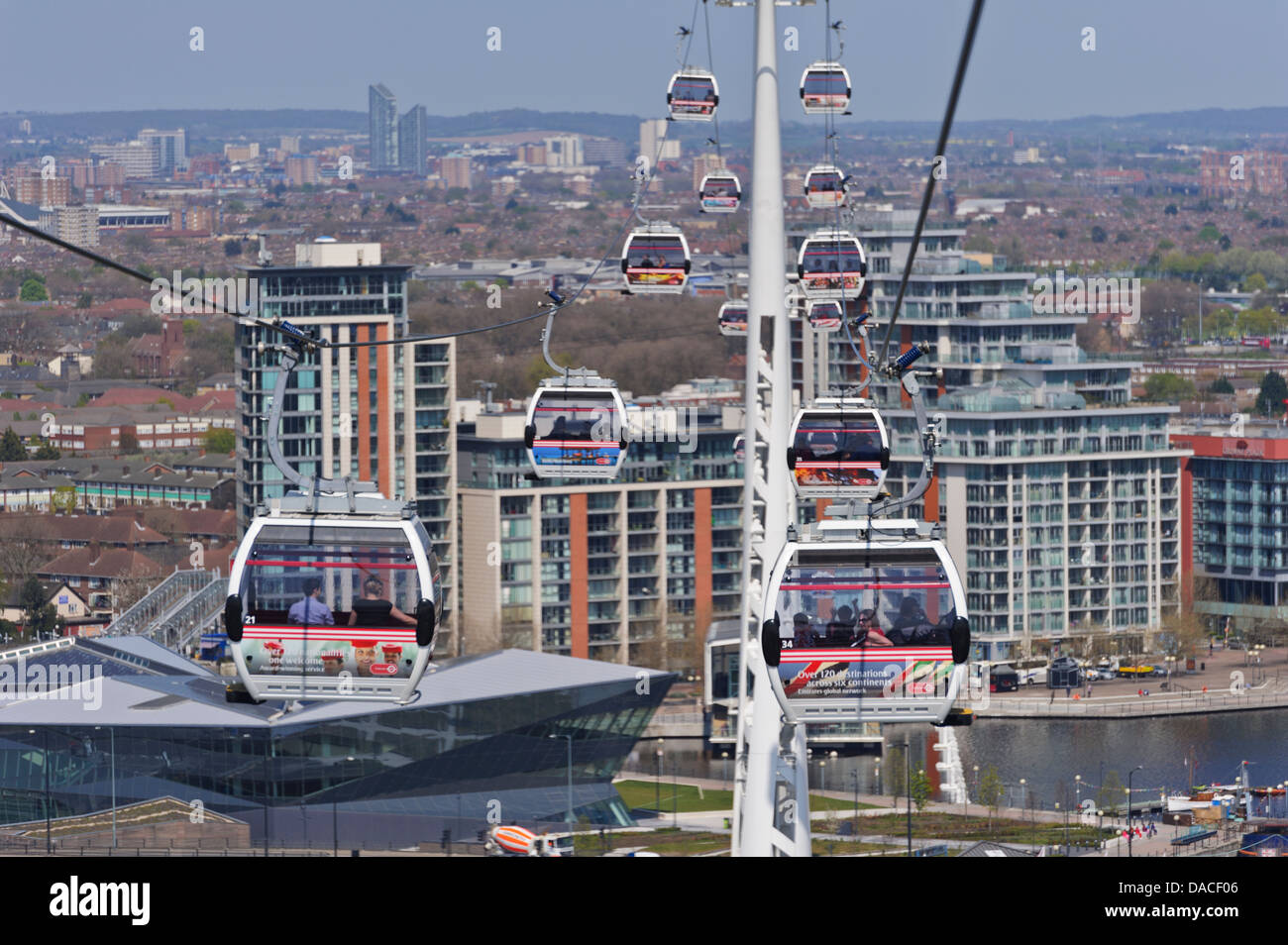 Cable cars in flight approaching the Royal Docks Terminal, London ...