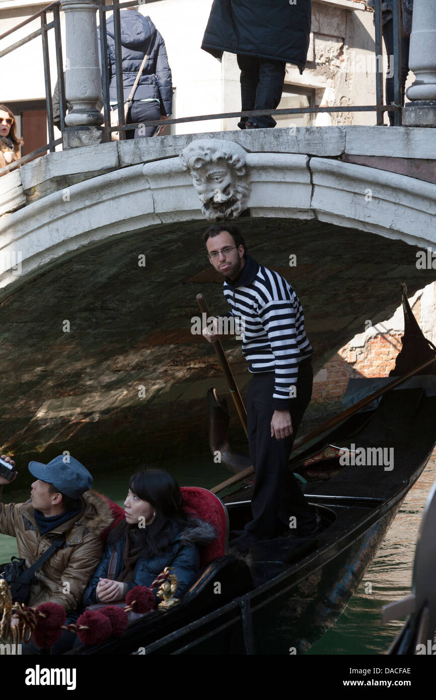 Gondoliere and Gondola in Canal, Venice, Italy Stock Photo - Alamy