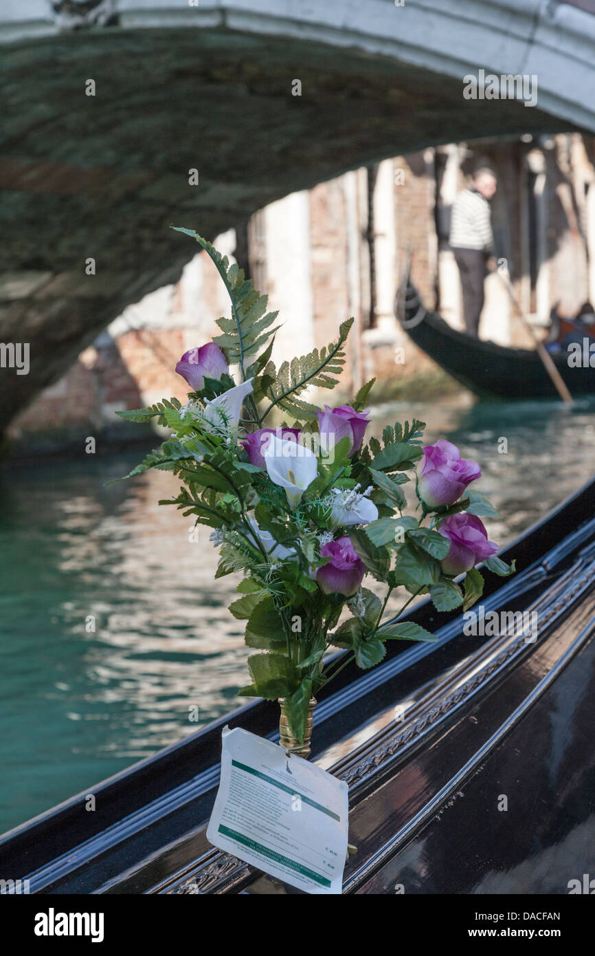 Flowers on gondola, Venice, Italy Stock Photo - Alamy